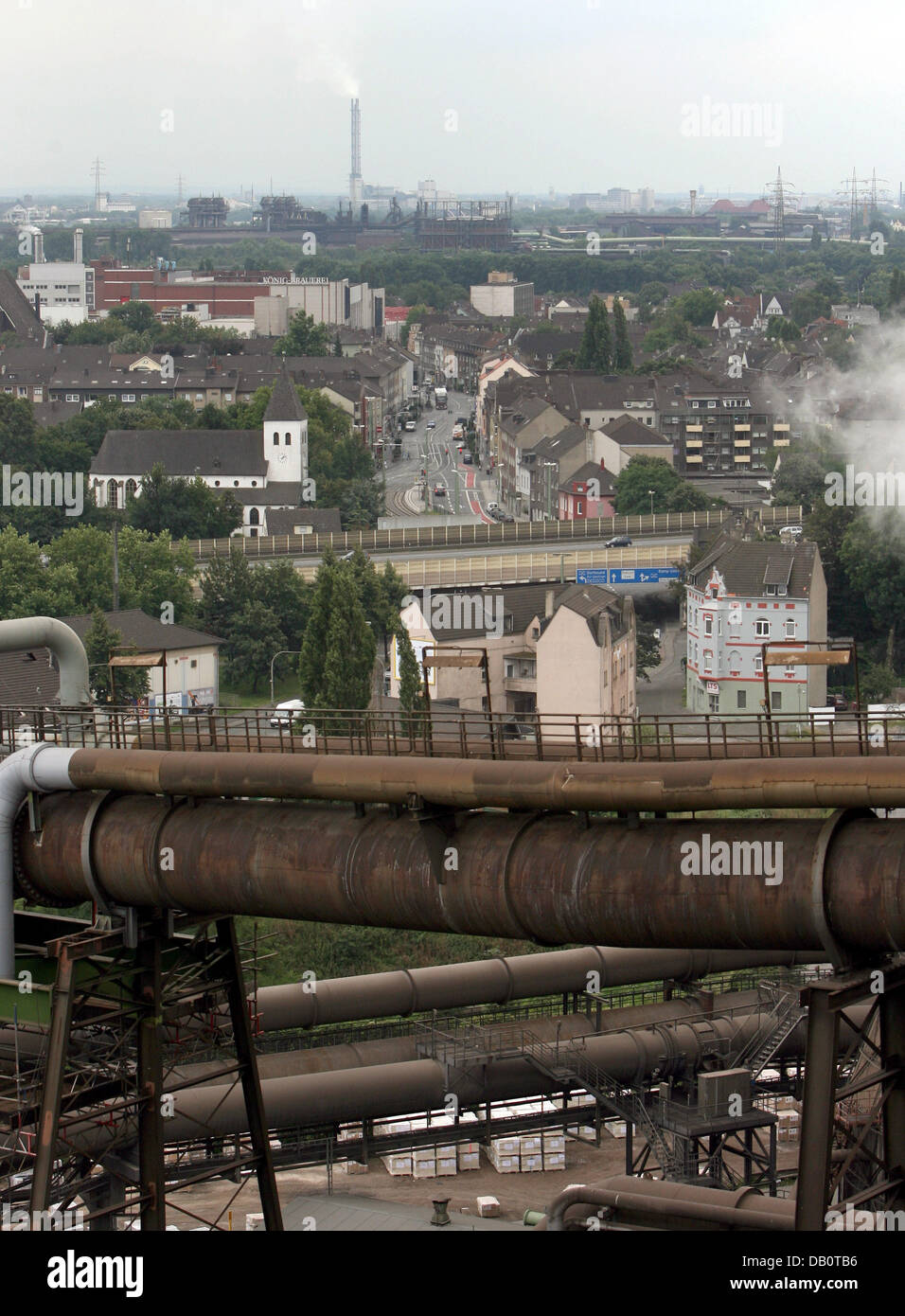 The picture shows tubes of the ThyssenKrupp steelworks in front of an ...
