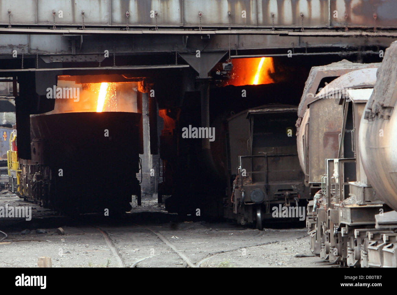 Liquid steel is poured into waggons at the ThyssenKrupp steelworks in ...
