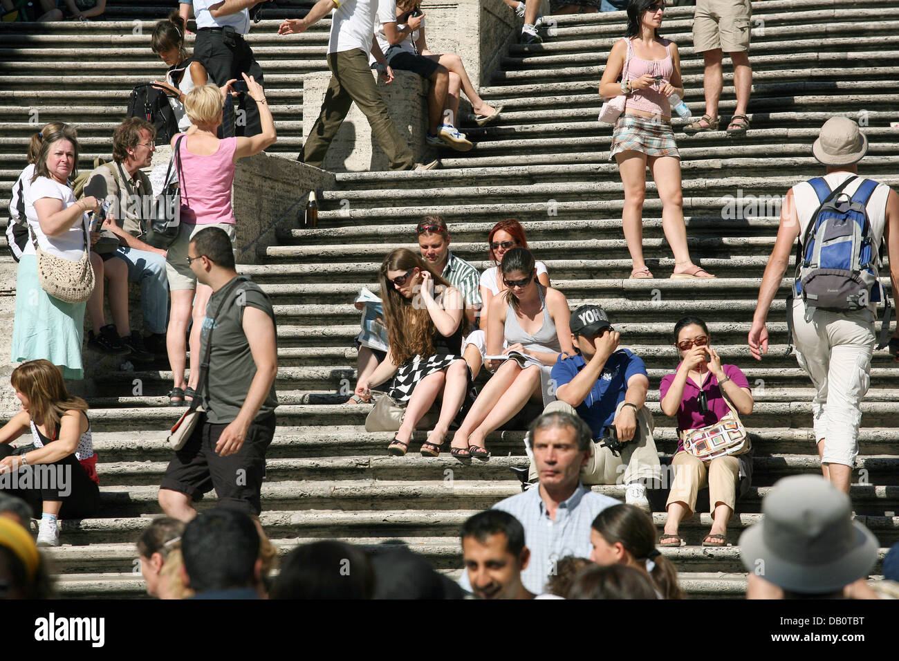 Group sitting on the spanish steps hi-res stock photography and images ...