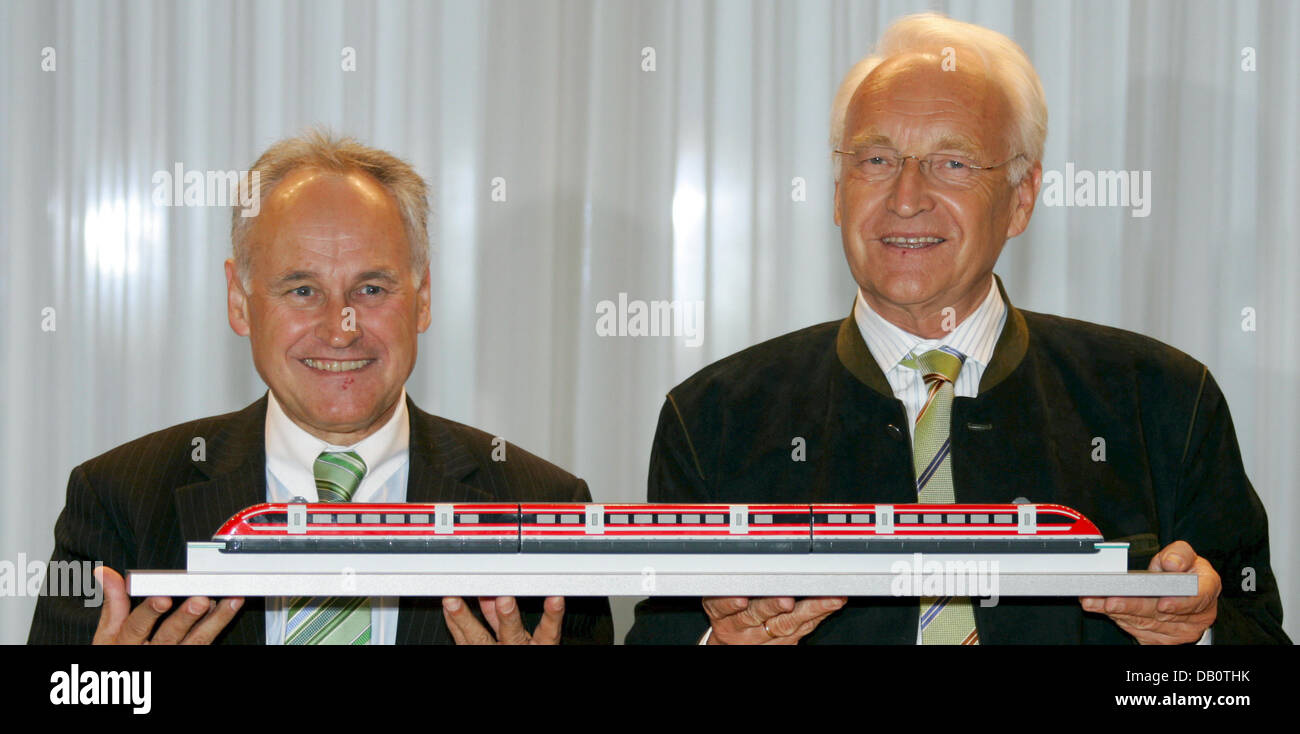 Outgoing Bavarian Prime Minister Edmund Stoiber (R) and Bavarian ...