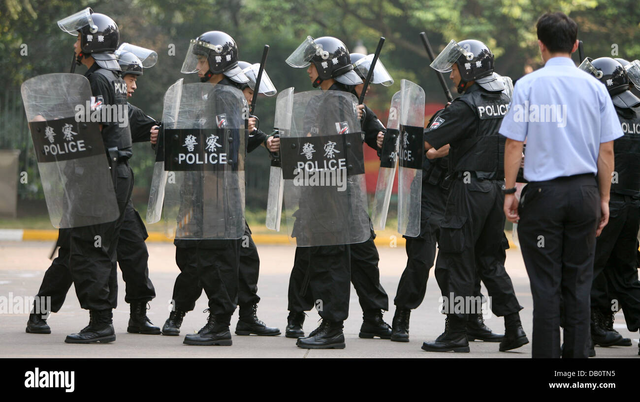 Chinese policemen shown during an exercise near Shanghai Stadium in ...