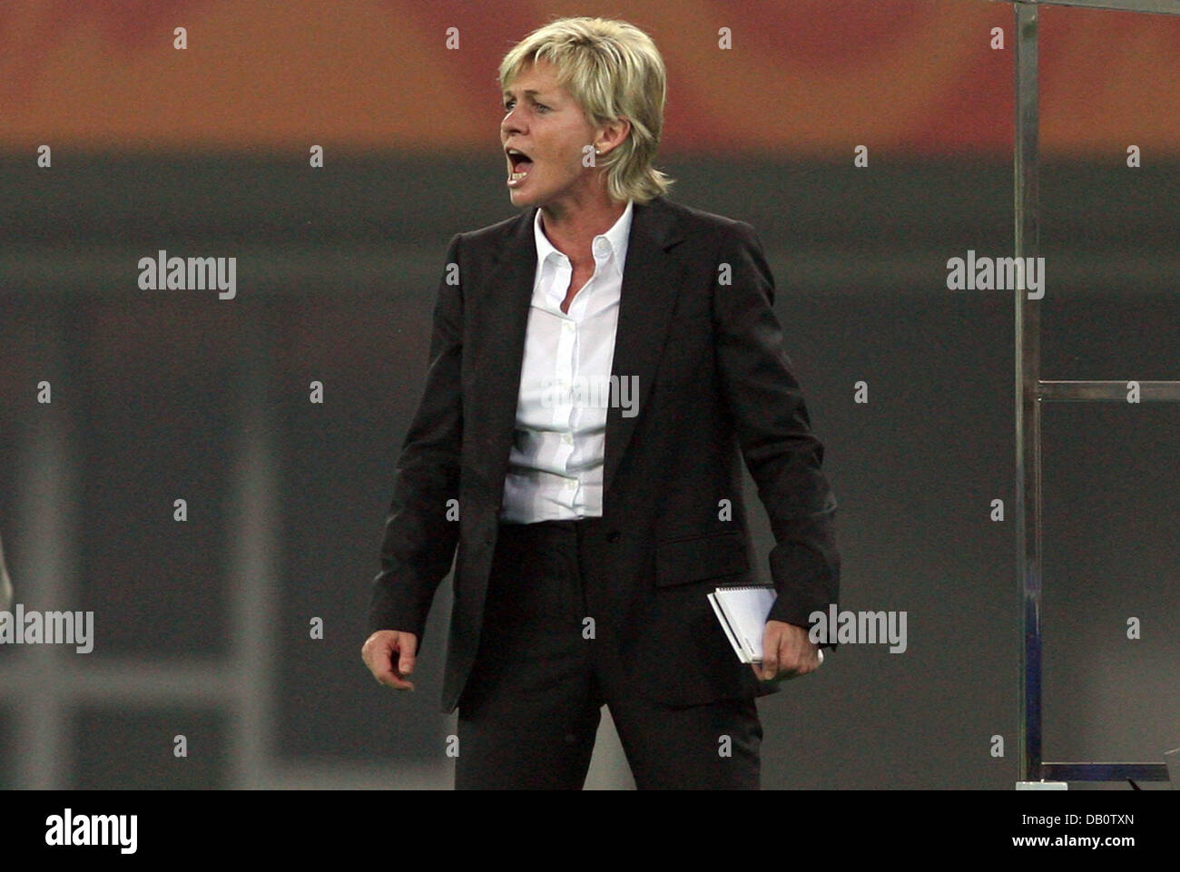 Germany's national coach Silvia Neid yells at the sideline during the ...