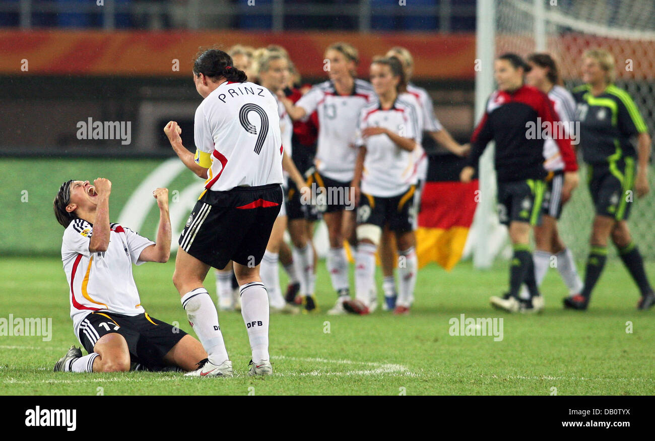 Germany's Birgit Prinz (front R), Ariane Hingst (front L) and their ...