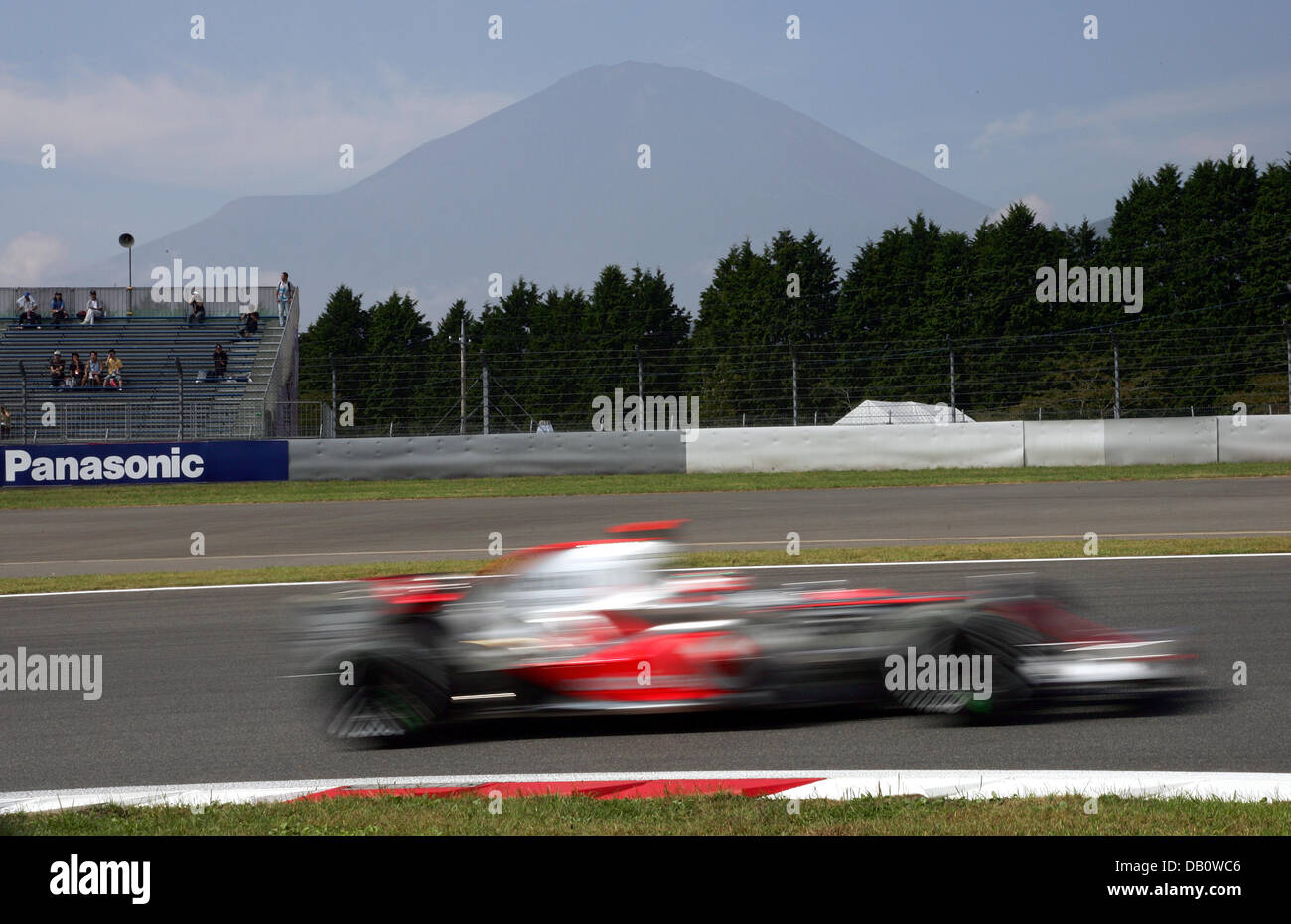 Spanish Formula One pilot Fernando Alonso of McLaren Mercedes passes ...