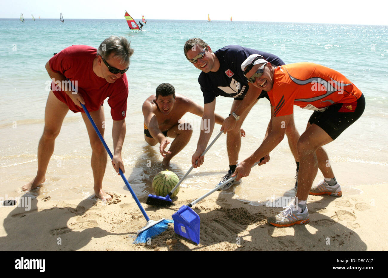 German biathlete Michael Greis (R) and German curling team (L-R ...
