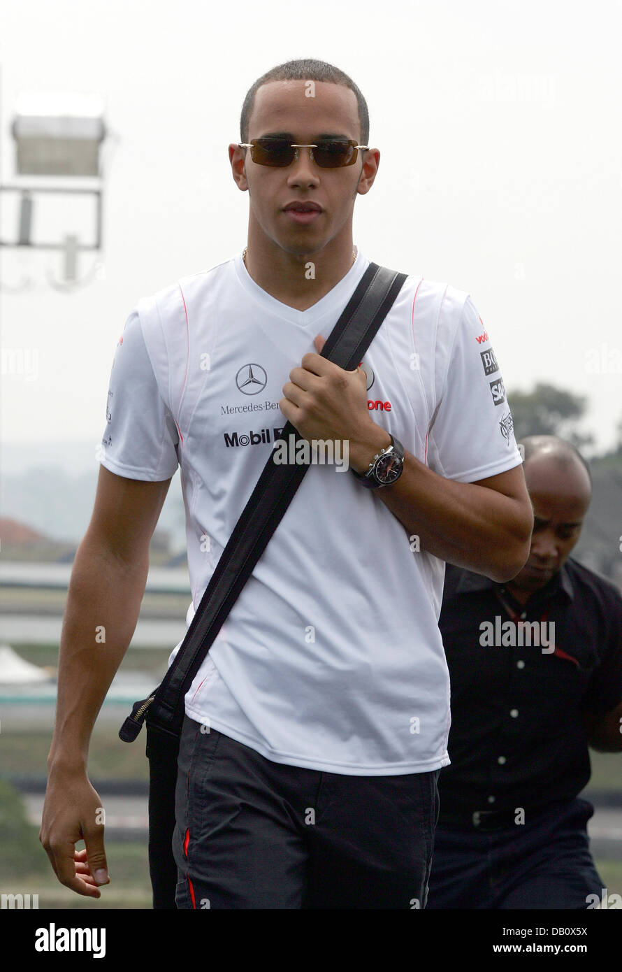 British Formula One driver Lewis Hamilton of McLaren Mercedes arrives ...