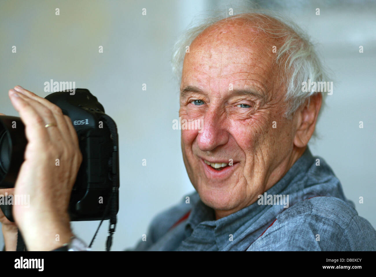 German photo journalist Thomas Hoepker is pictured with his camera in ...