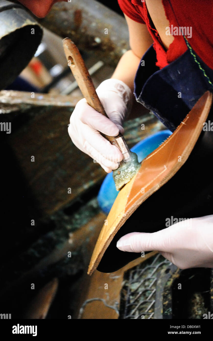 Working in the shoe shop Stock Photo - Alamy