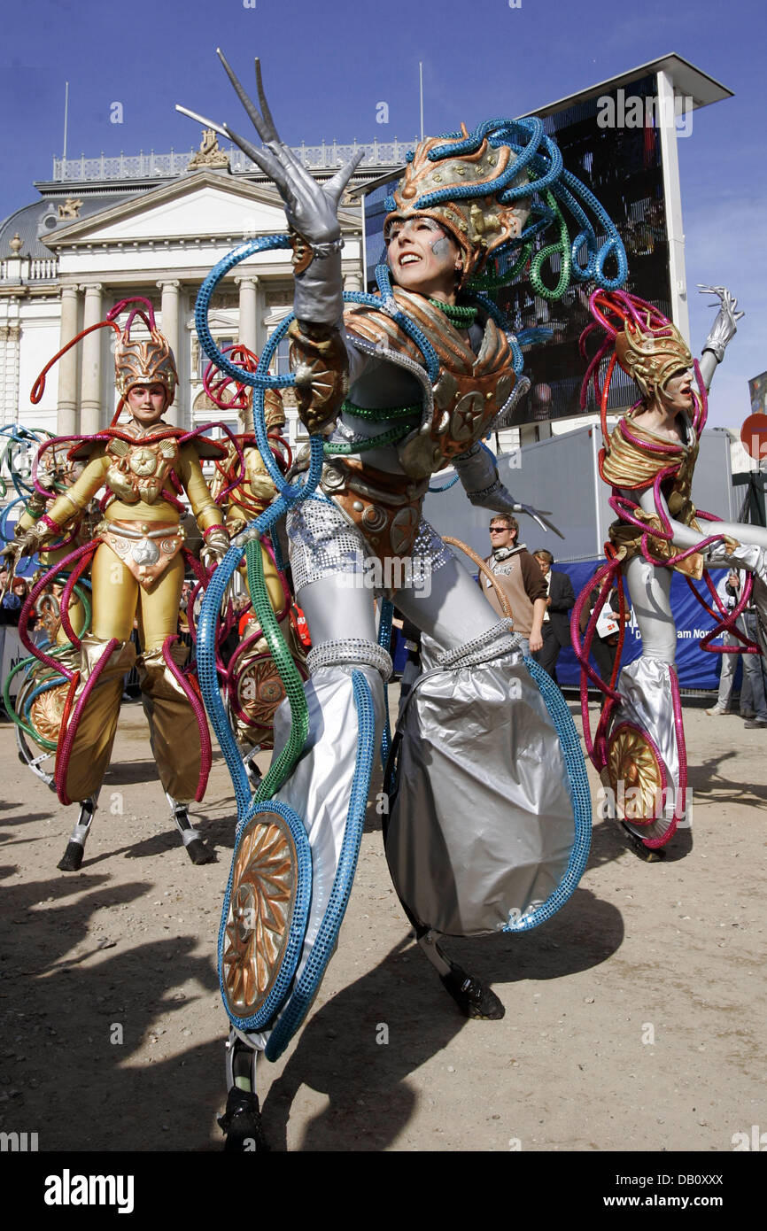 Dancers in elaborate costumes participate in the Germany parade on the ...