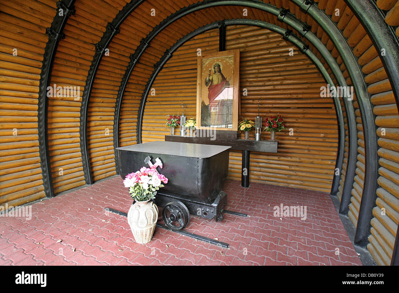 The photo depicts the altar inside a wooden chapel in the Silesian coal ...
