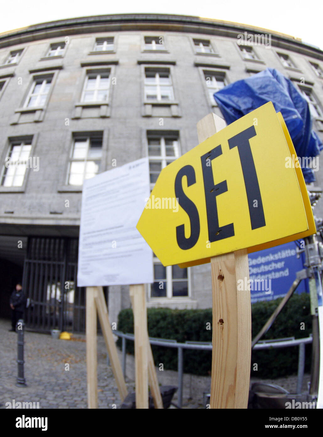 A sign directs to the entrance of the German Resistance Memorial Centre ...