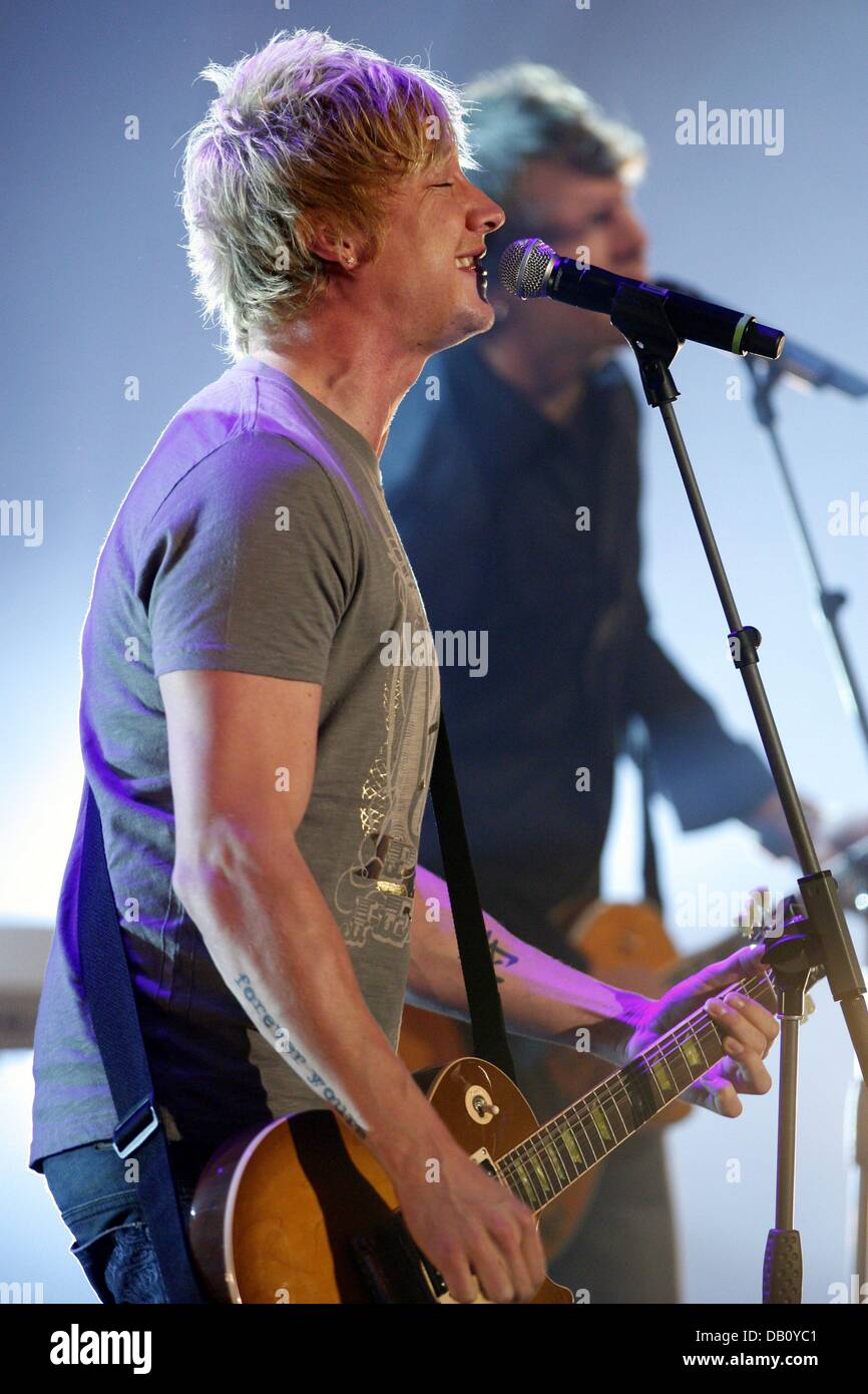 Leadsinger Samu Haber (front) performs with his Finnish rock band ...