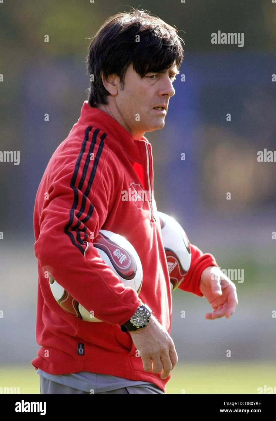 The coach of the German national team Joachim Loew is pictured with two ...