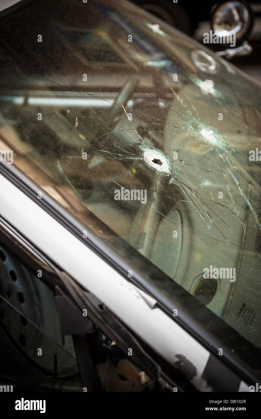Bullet riddled automobile windshield nyc hi-res stock photography and ...
