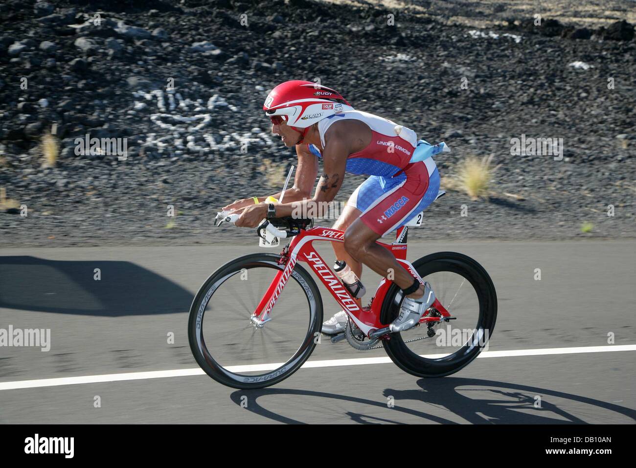 Australian triathlete Chris McCormack shown in action during the cycling section of the Ironman ...
