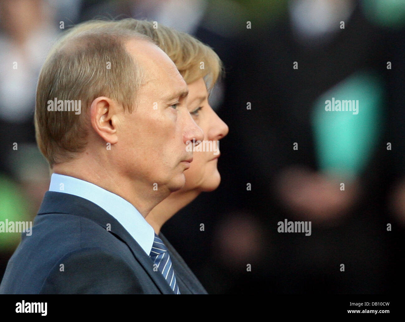 German Chancellor Angela Merkel receives the Russian President Vladimir ...
