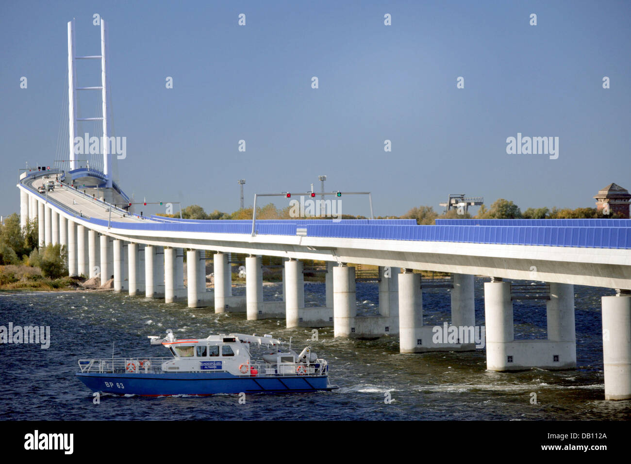A boat of the Water Protection Police crosses under the new and second ...