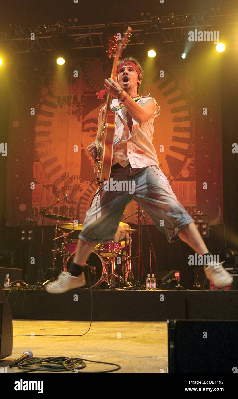 French-born musician Manu Chao jumps during his show in Hamburg ...