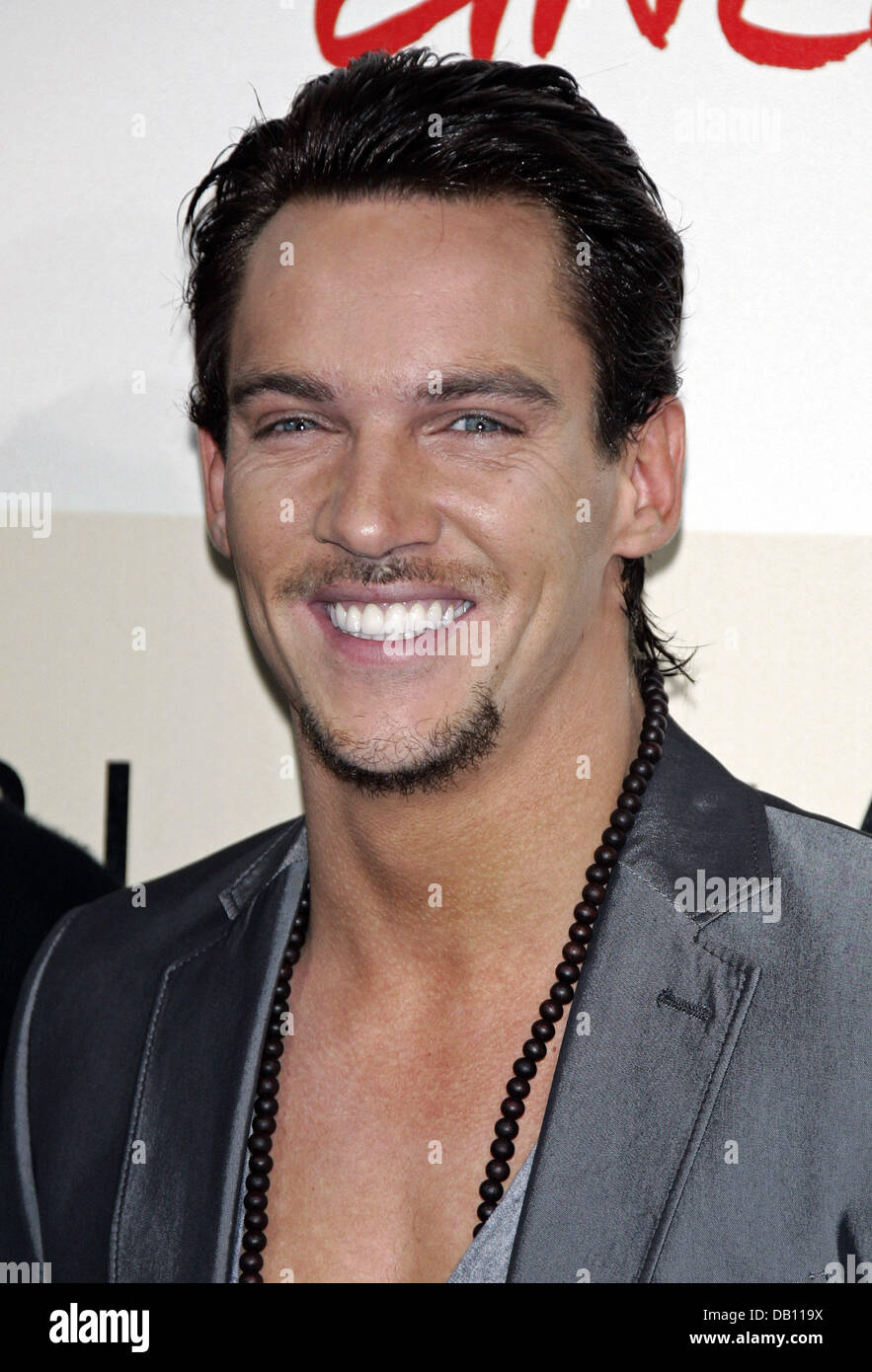 Irish actor Jonathan Rhys-Meyers smiles for the cameras as se arrives ...