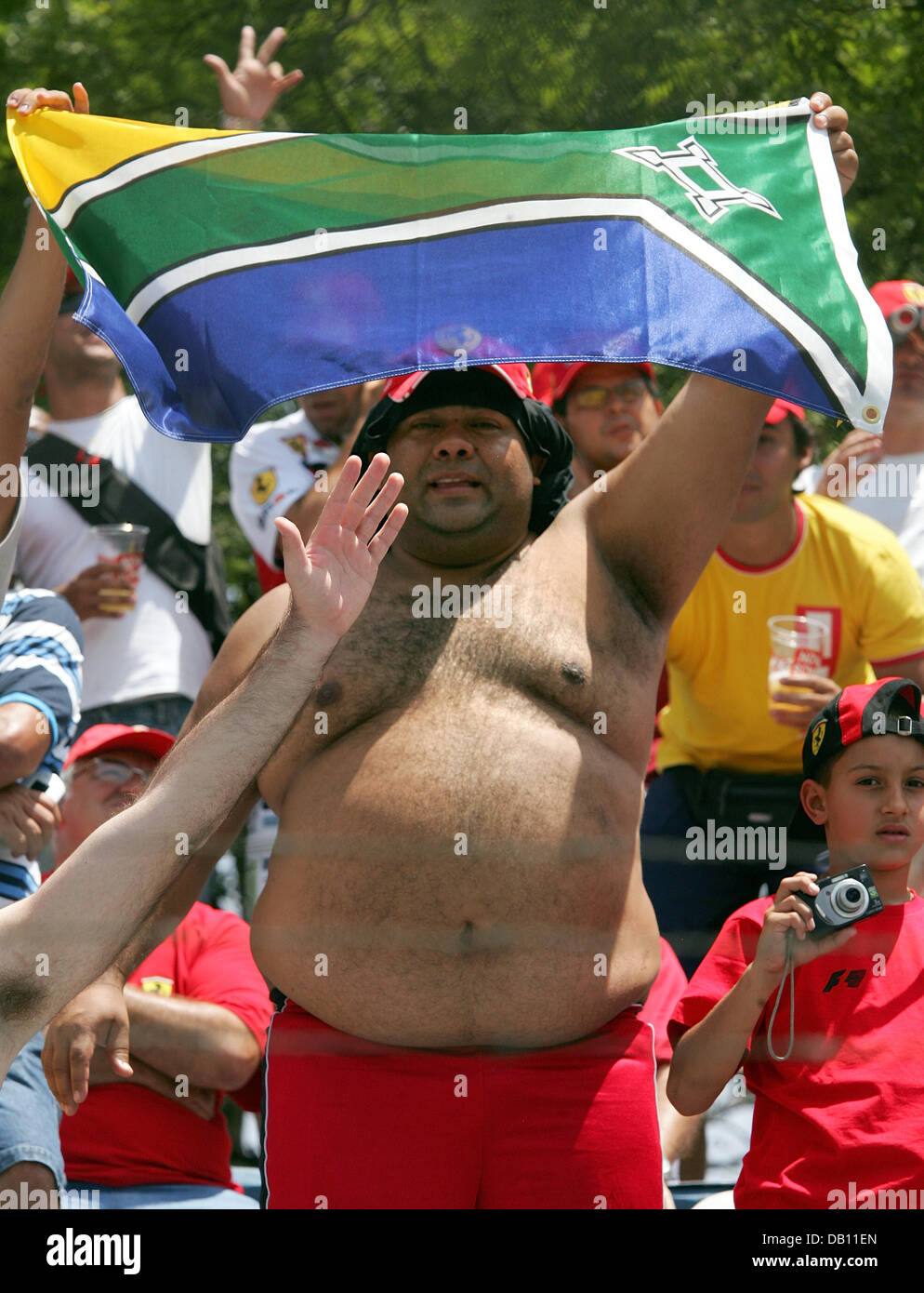 Brazilian Formula One fans hold a Brazilian before the Formula One ...