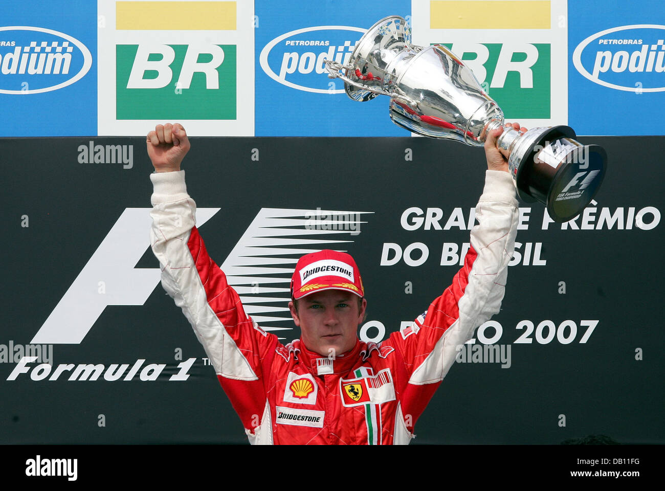 Finnish Formula One driver Kimi Raikkonen of Ferrari celebrates on the ...