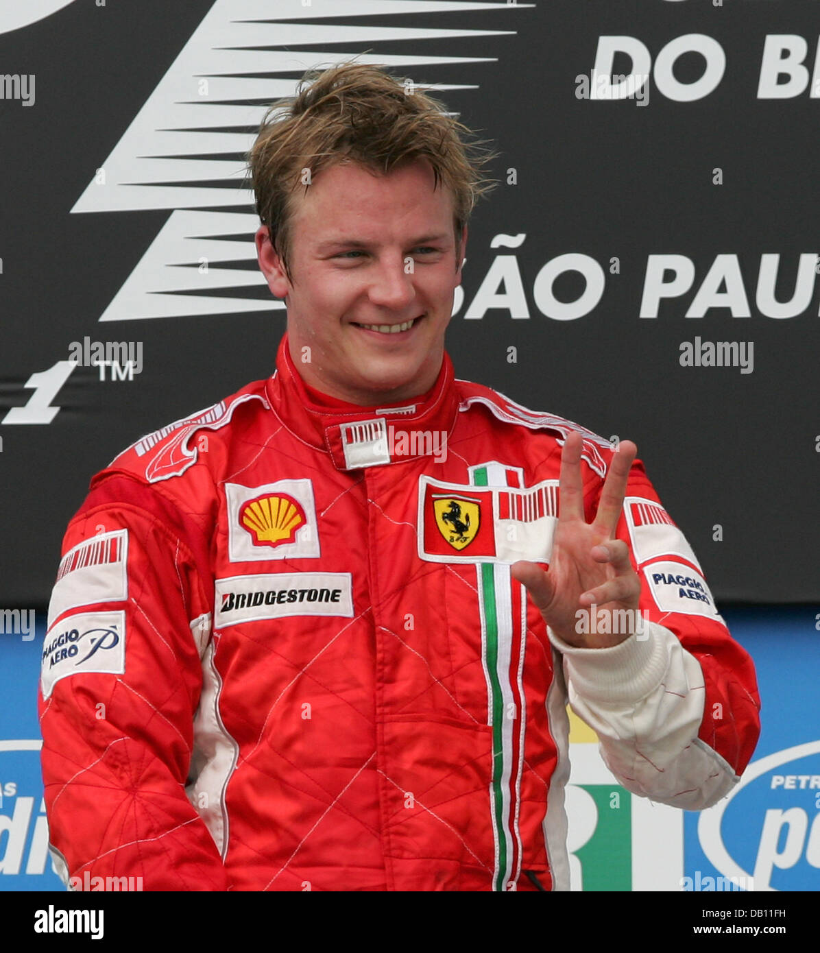 Finnish Formula One driver Kimi Raikkonen of Ferrari smiles on the ...