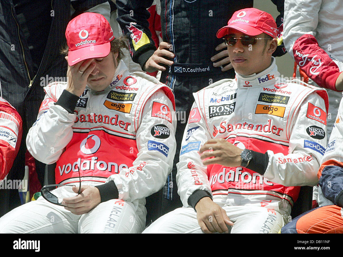 British Formula One rookie Lewis Hamilton (R) of McLaren Mercedes, and ...