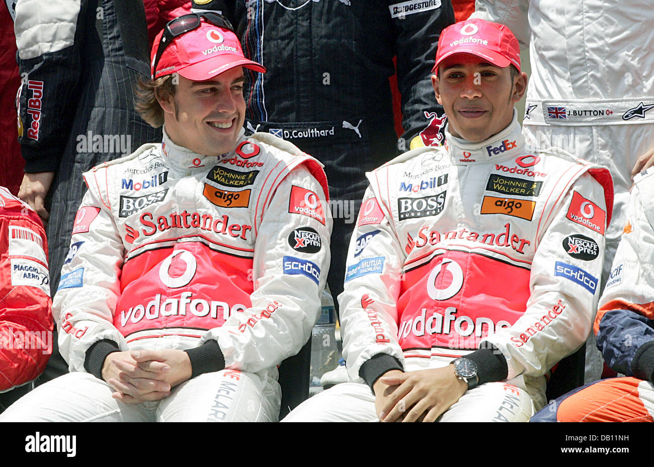 British Formula One rookie Lewis Hamilton (R) of McLaren Mercedes, and ...