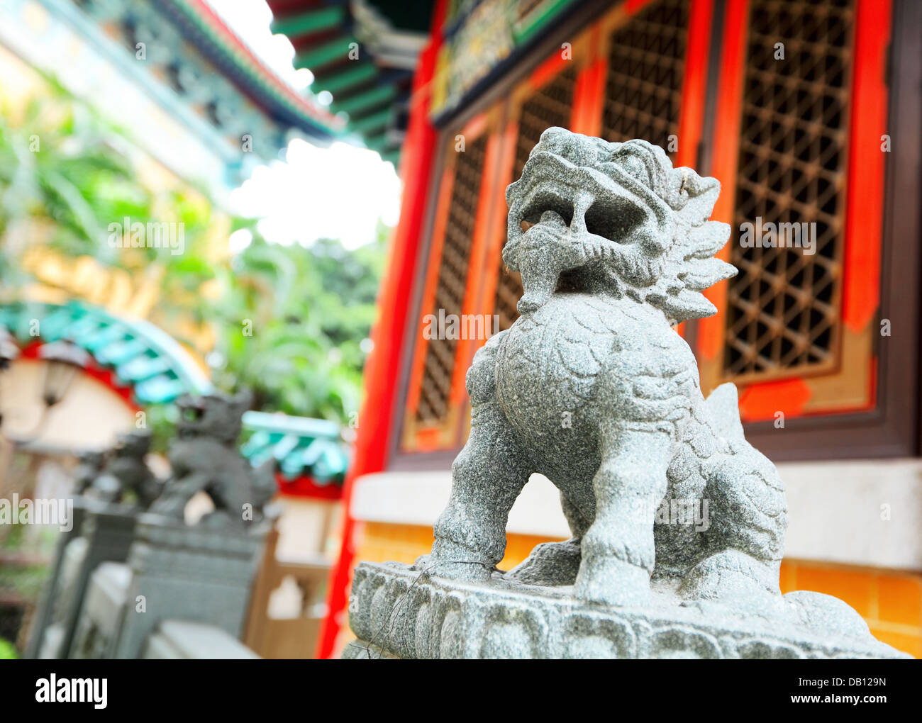 Chinese stone lion Stock Photo - Alamy