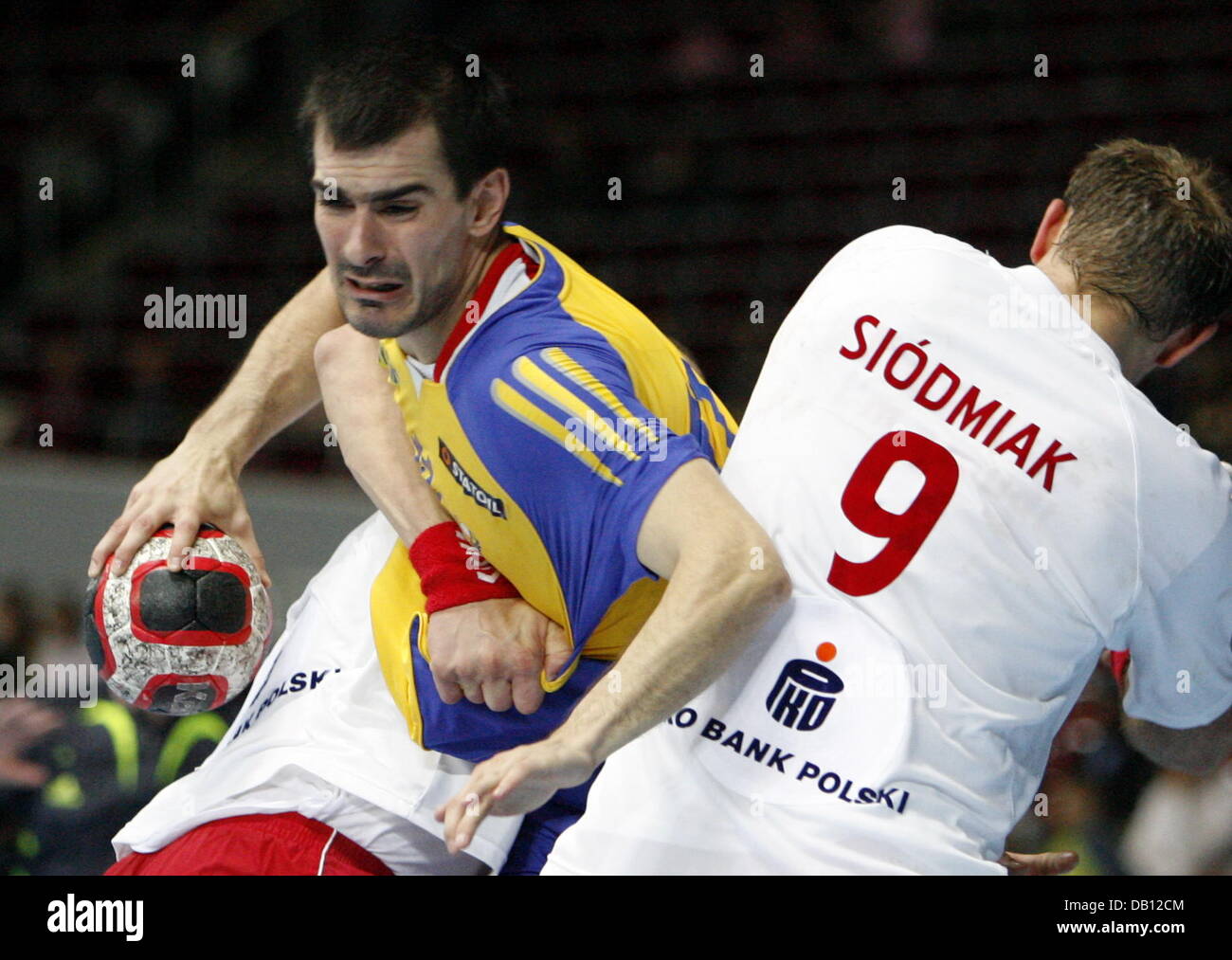 Swedish international Dalibor Doder (C) is blocked by Poland?s Artur ...