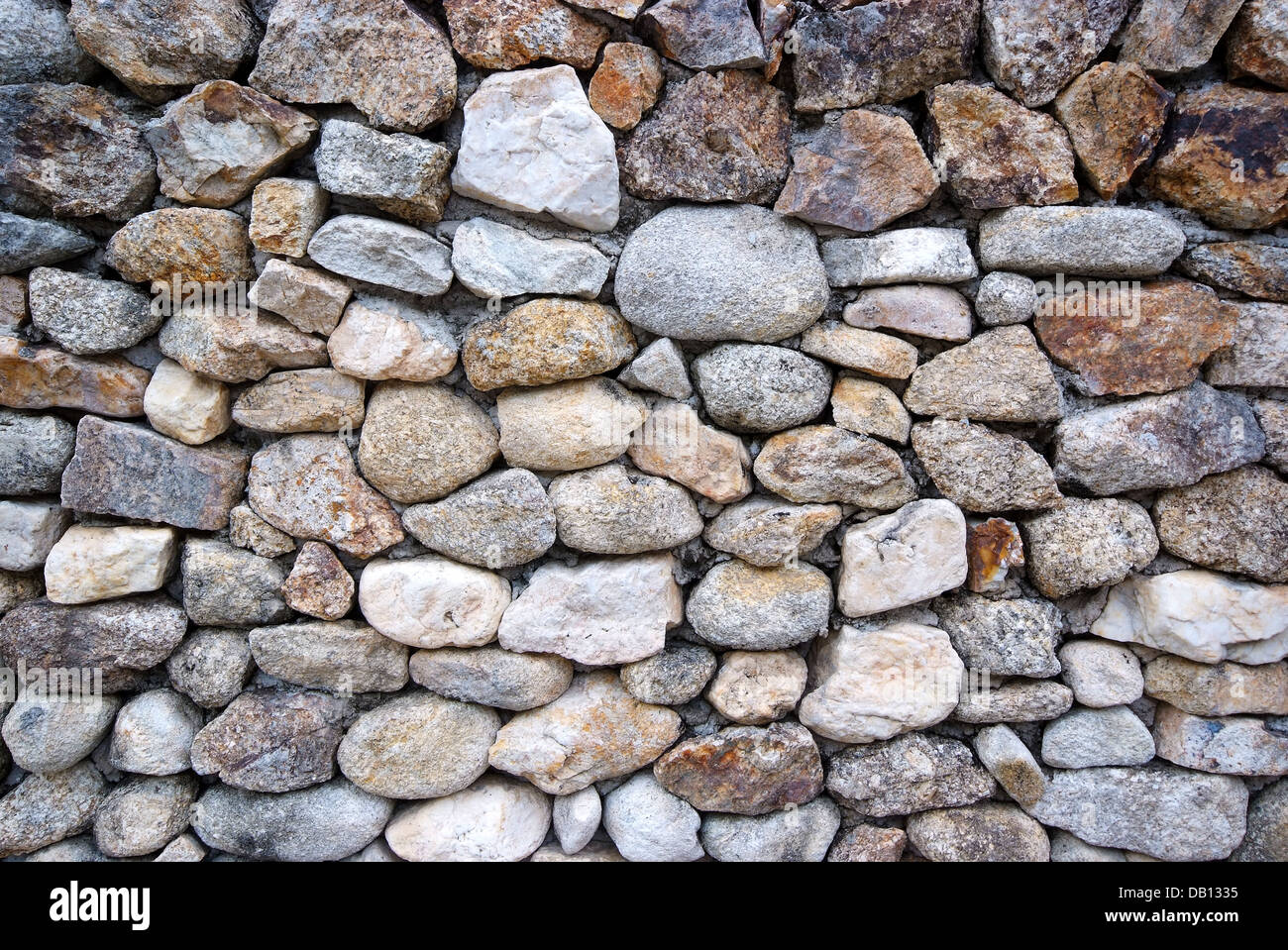 Background and texture of stone wall Stock Photo - Alamy
