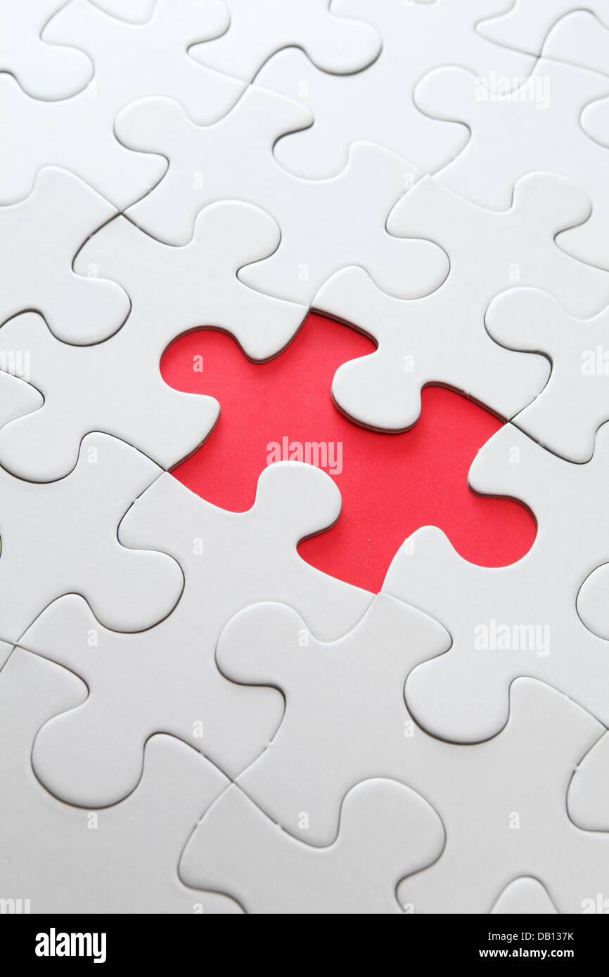 puzzle with missing red piece Stock Photo - Alamy