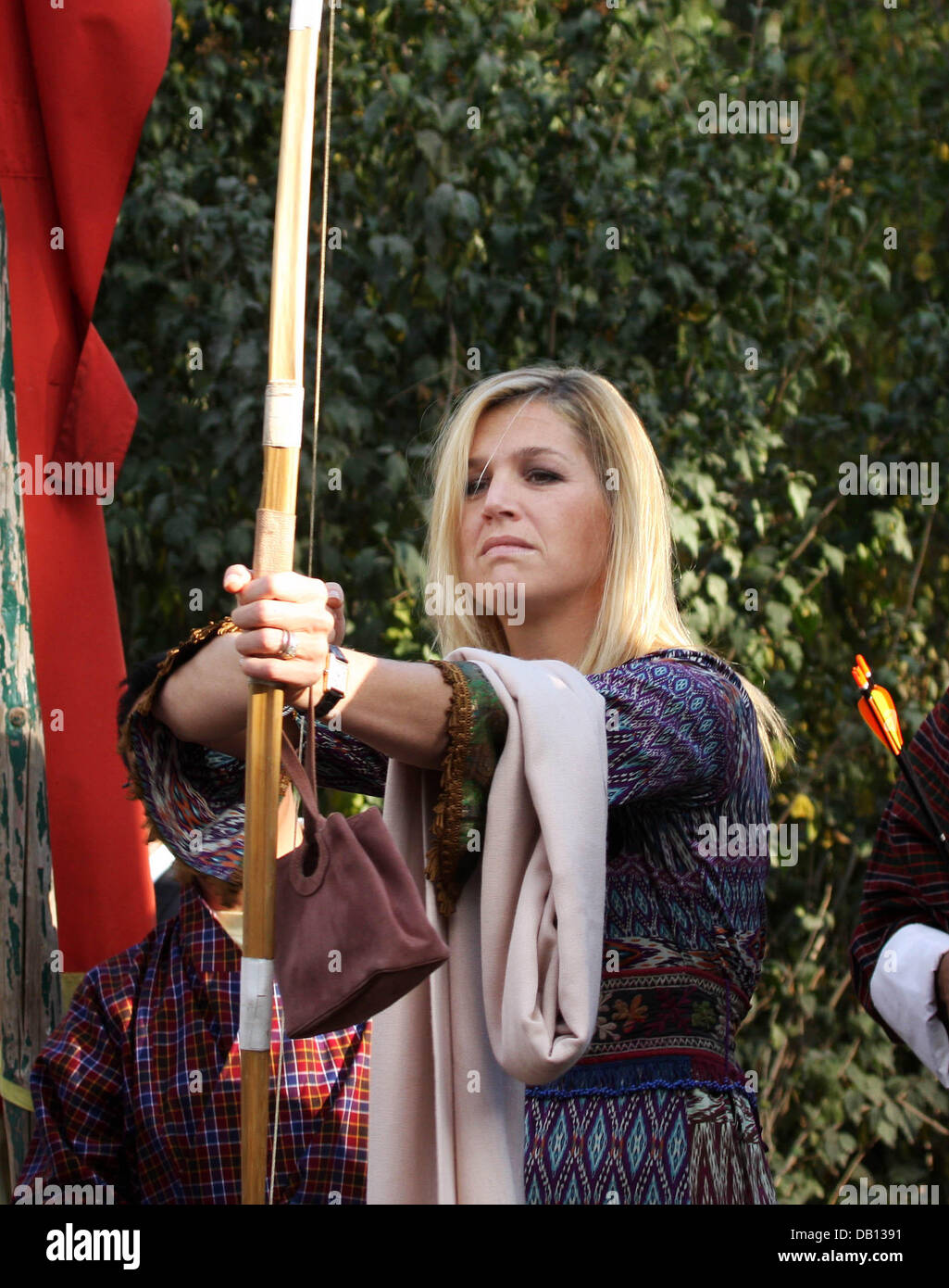 Crown Princess Maxima shoots with bow and arrow at the archery ...