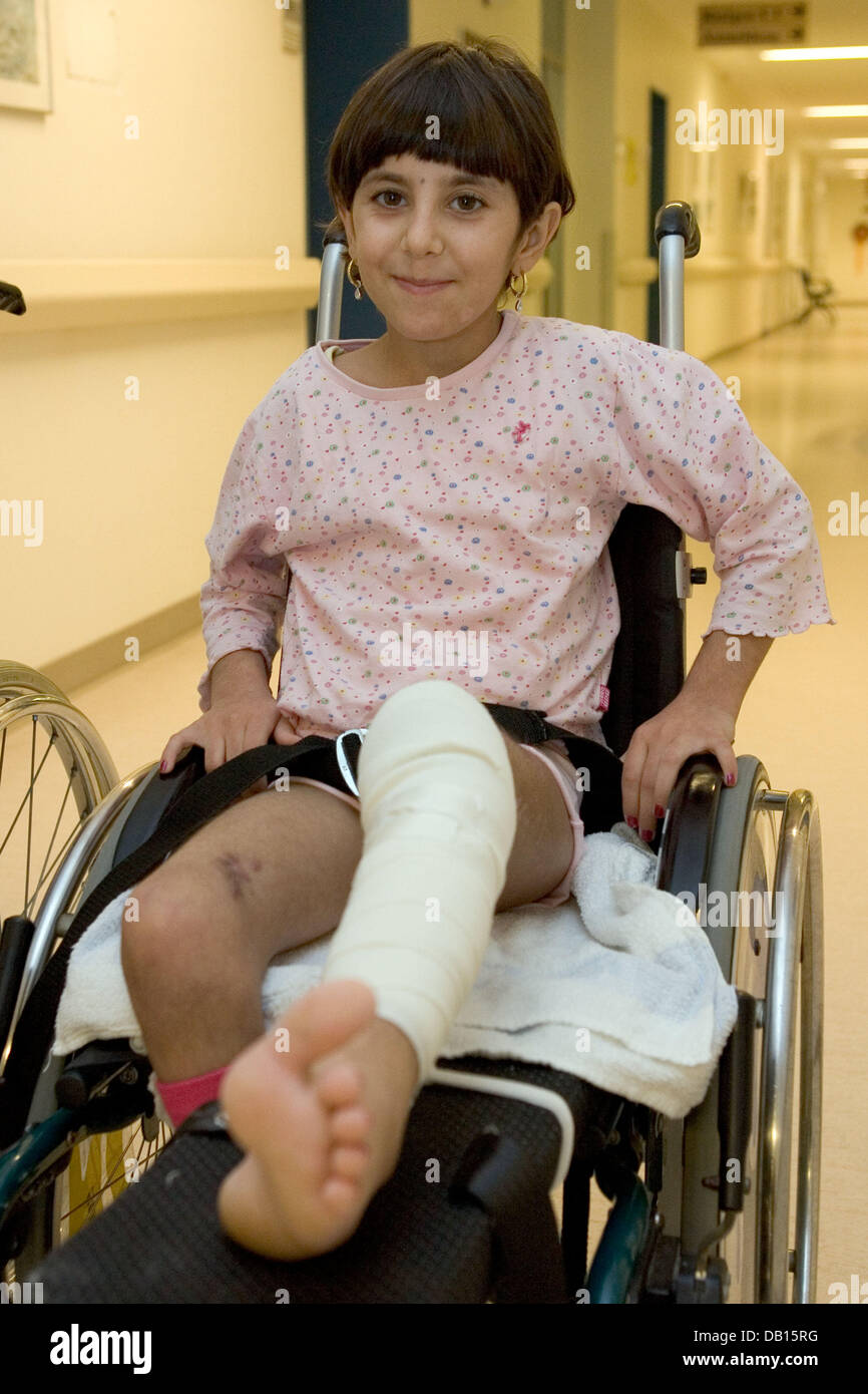 Eight-year-old Asia Keso smiles having her broken leg operated at ...