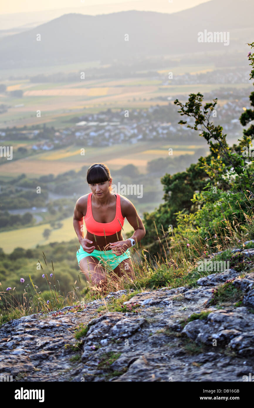 Running in sunset hi-res stock photography and images - Alamy