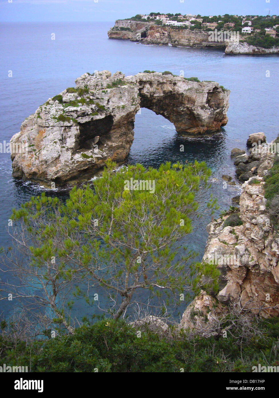 Rock formation Es Pontas seen at the bay of Cala Santanyi on the ...