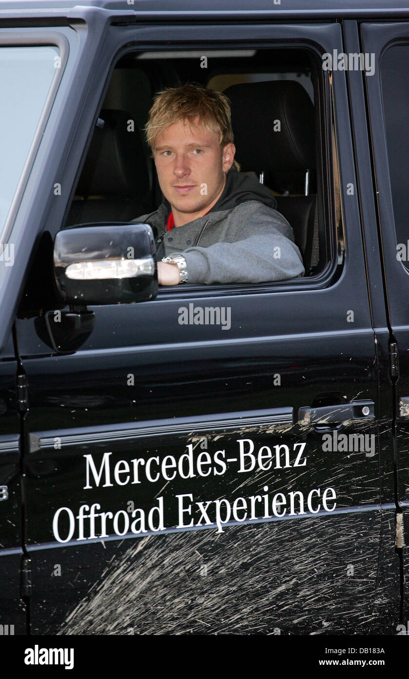 Mike Hanke, striker of Germany's national soccer team, smiles in a ...