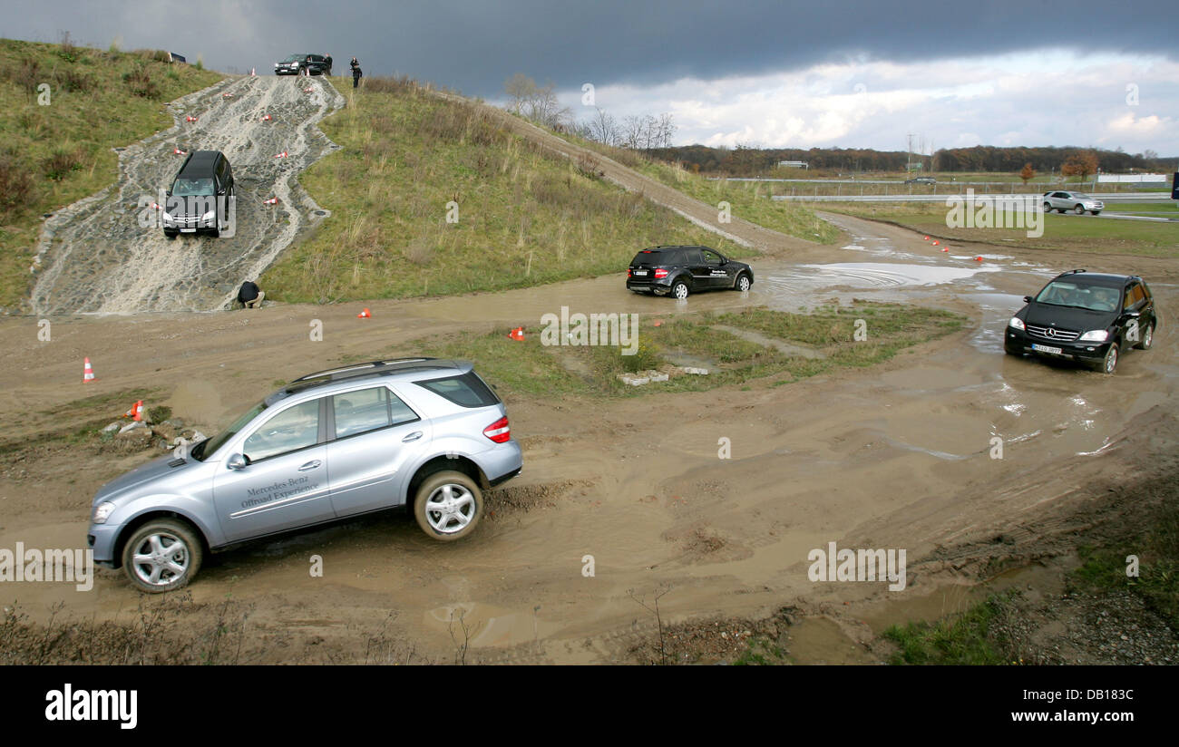 Players of Germany's national soccer team drive Mercedes-Benz offroad ...