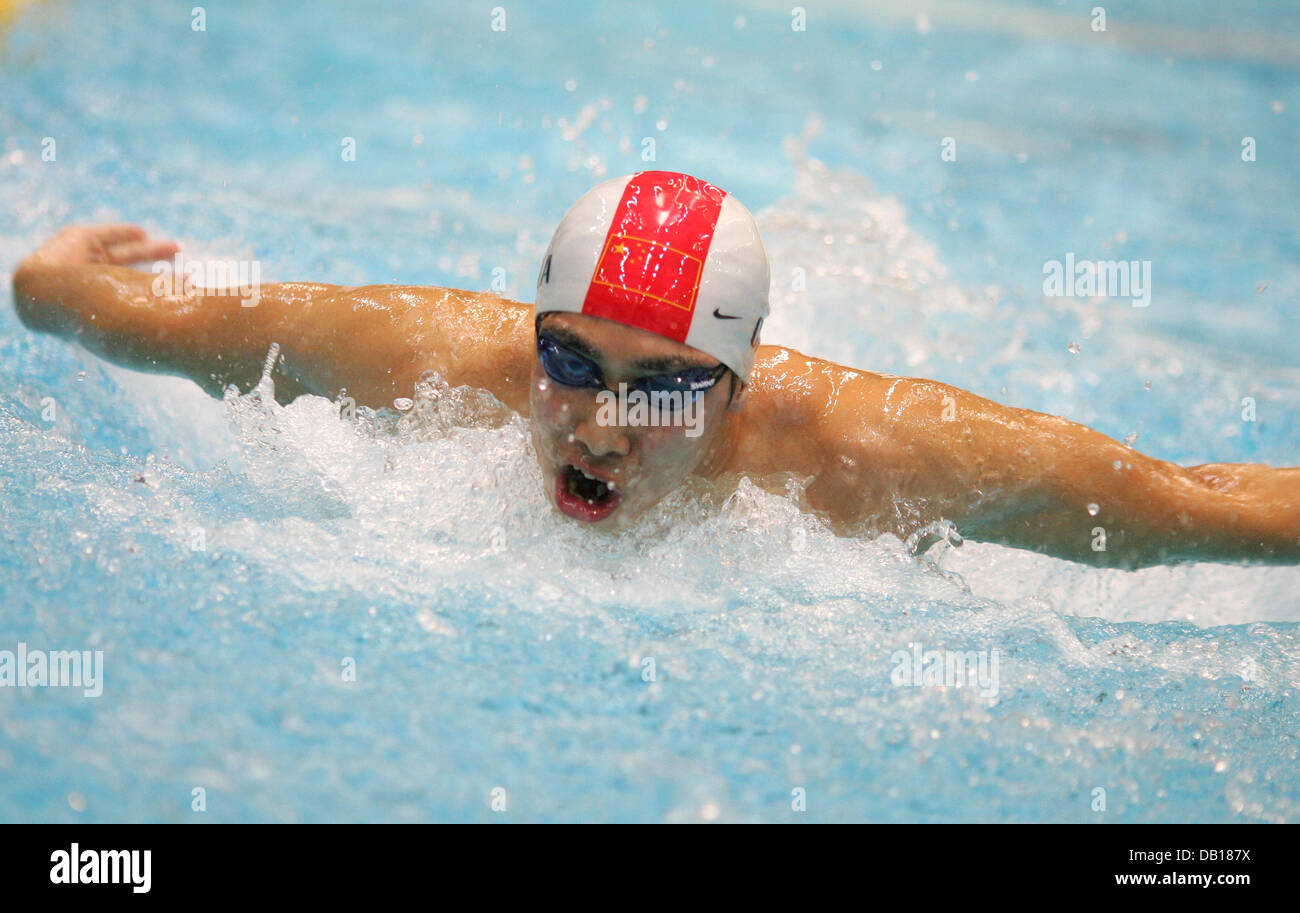 Chinese swimmer Yin Chen shown in action during the 100m preliminary ...