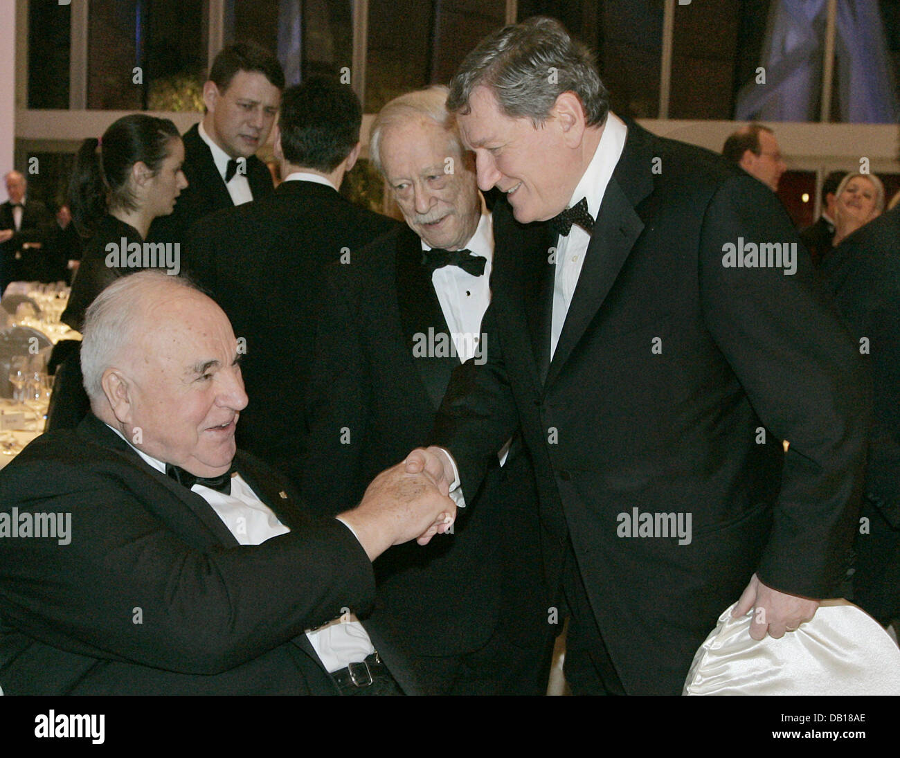 Director of the Jewish Museum Berlin, W. Michael Blumenthal (C) stands ...