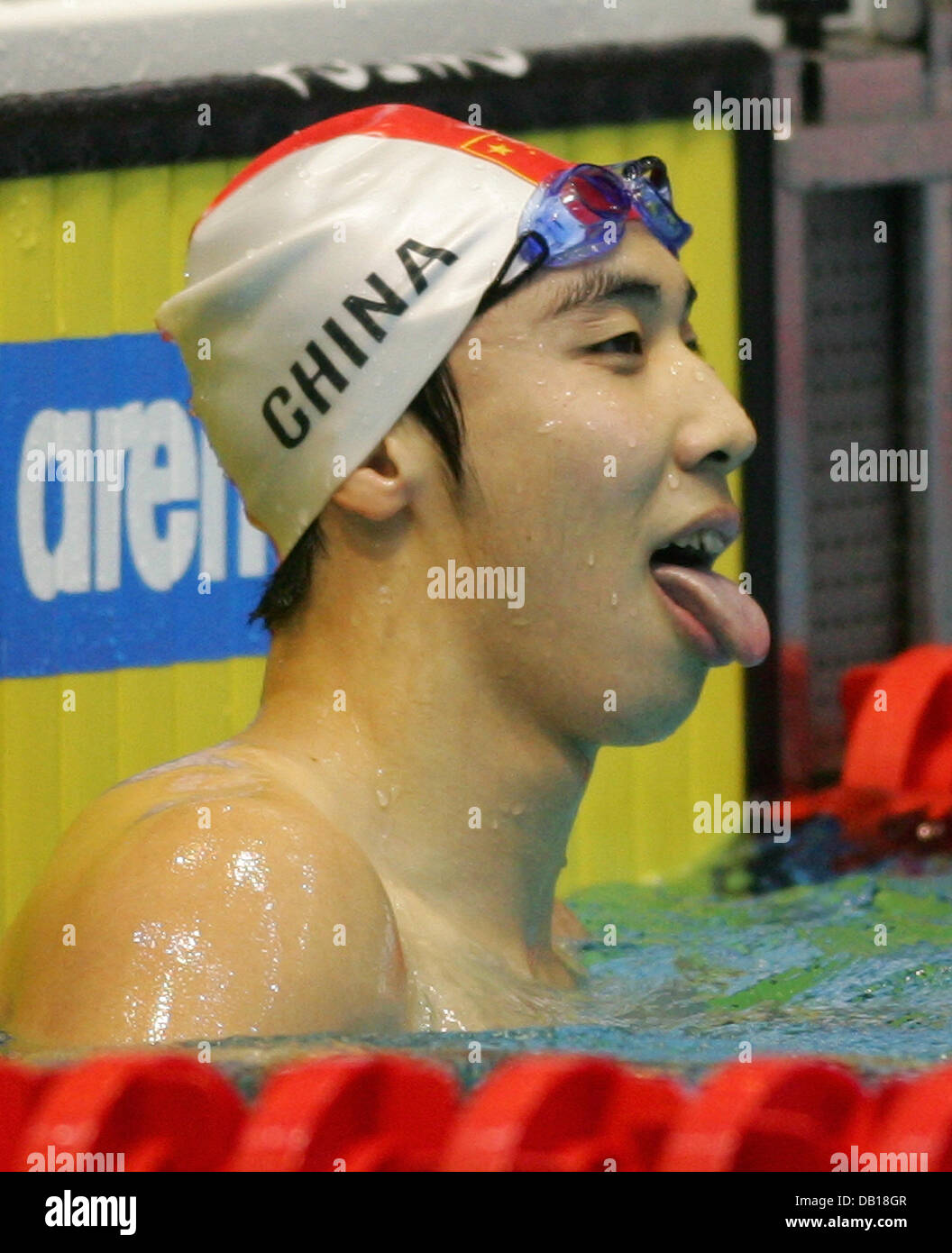 Chinese swimmer Yin Chen gestures after winning the 200 metres ...