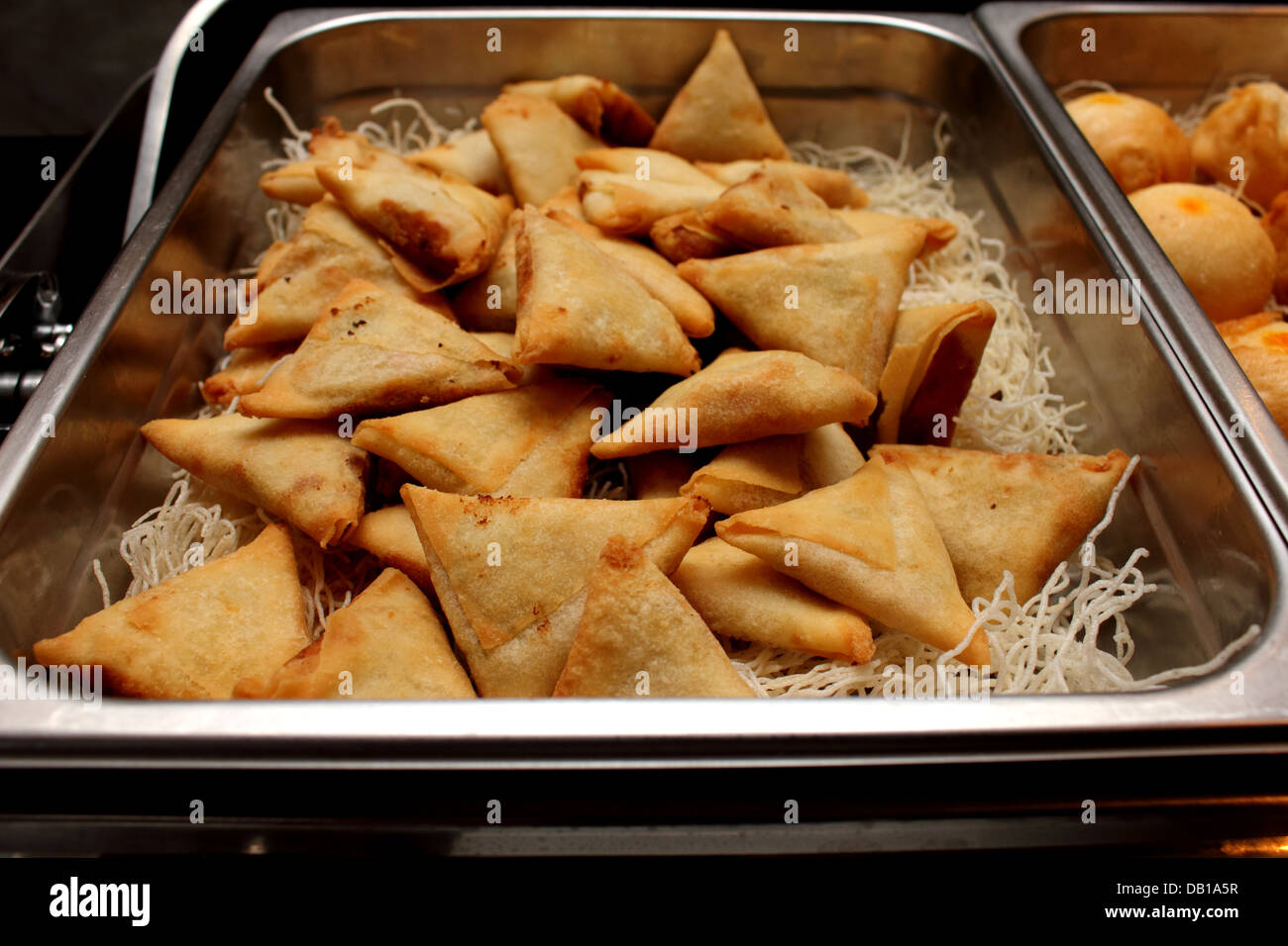 The indian samosa's on an ndian style Stock Photo - Alamy