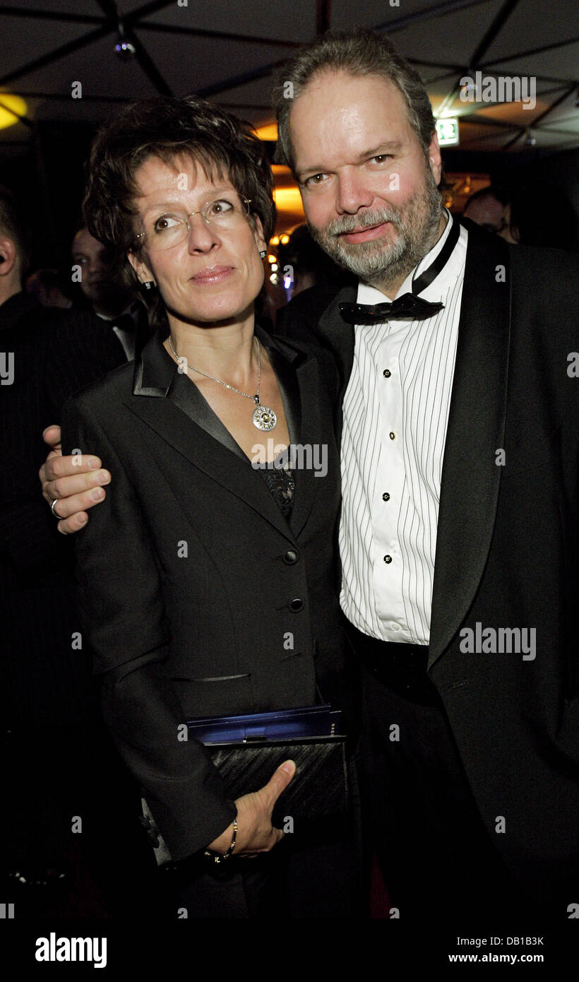 CEO of energy group EnBW, Utz Claassen (R) and his wife Annette (L ...