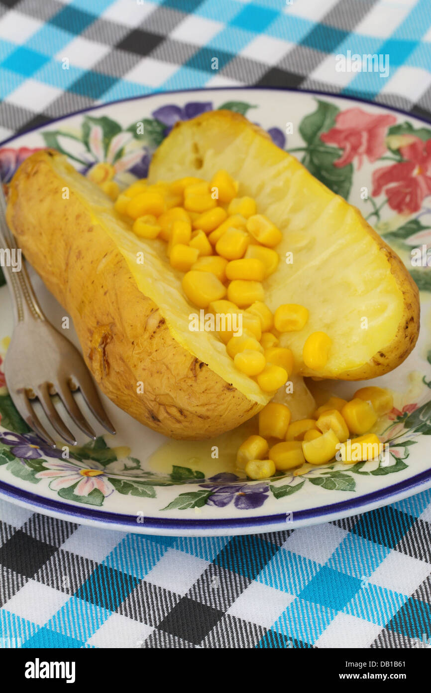 Jacket potato with cheese and sweetcorn, close up Stock Photo - Alamy