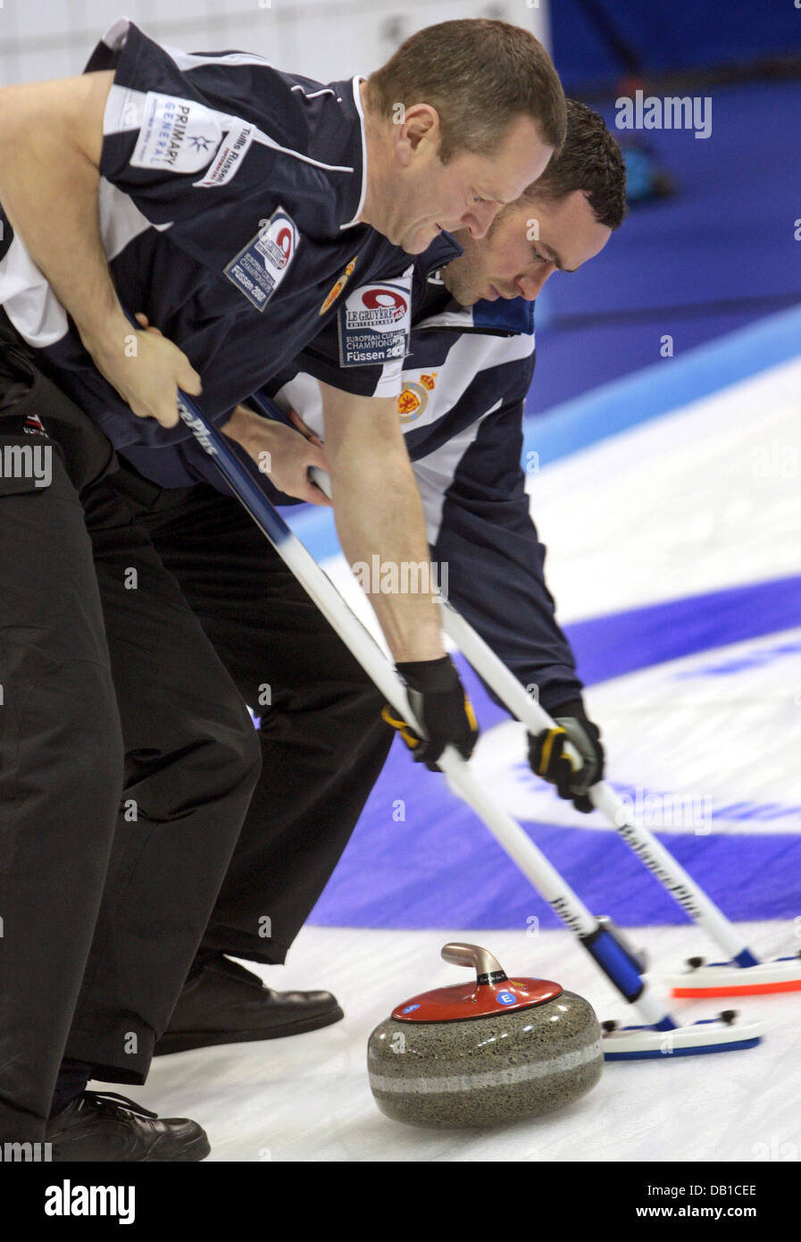 Scots Peter Smith (L) and David Murdoch (R) are shown in action during ...
