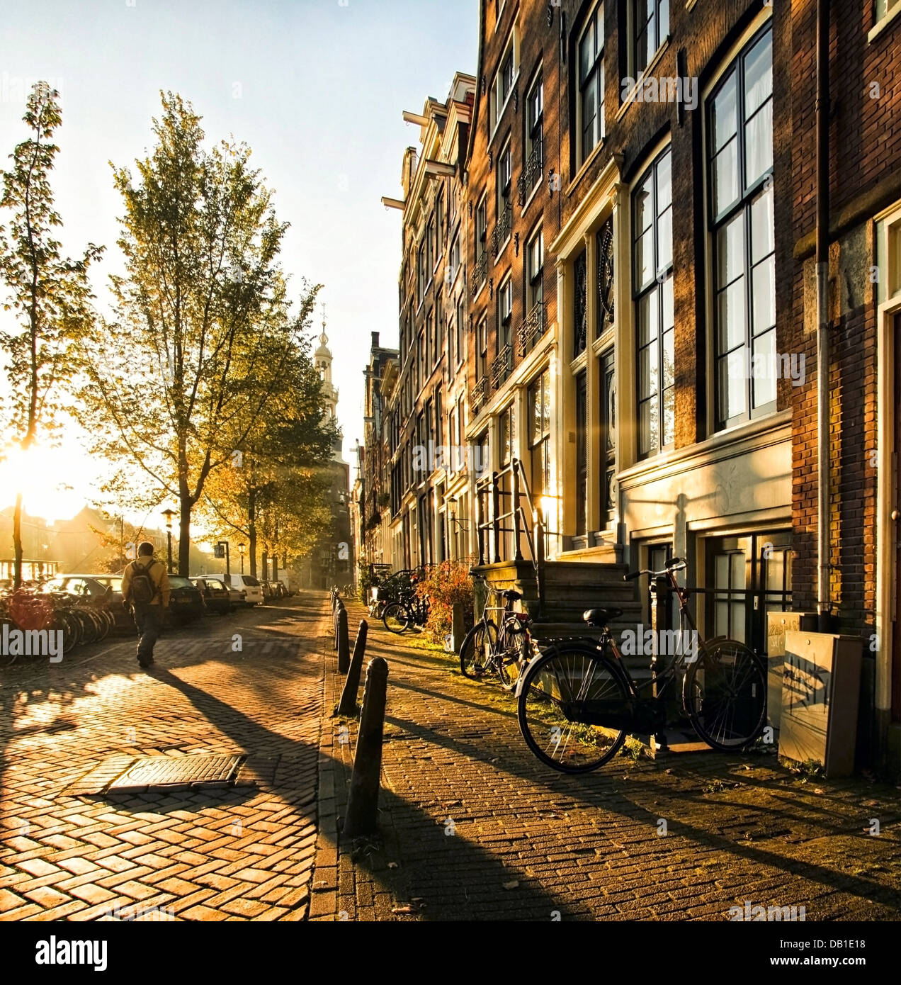 Wonderful and idyllic street scene at sunset in Amsterdam Stock Photo ...