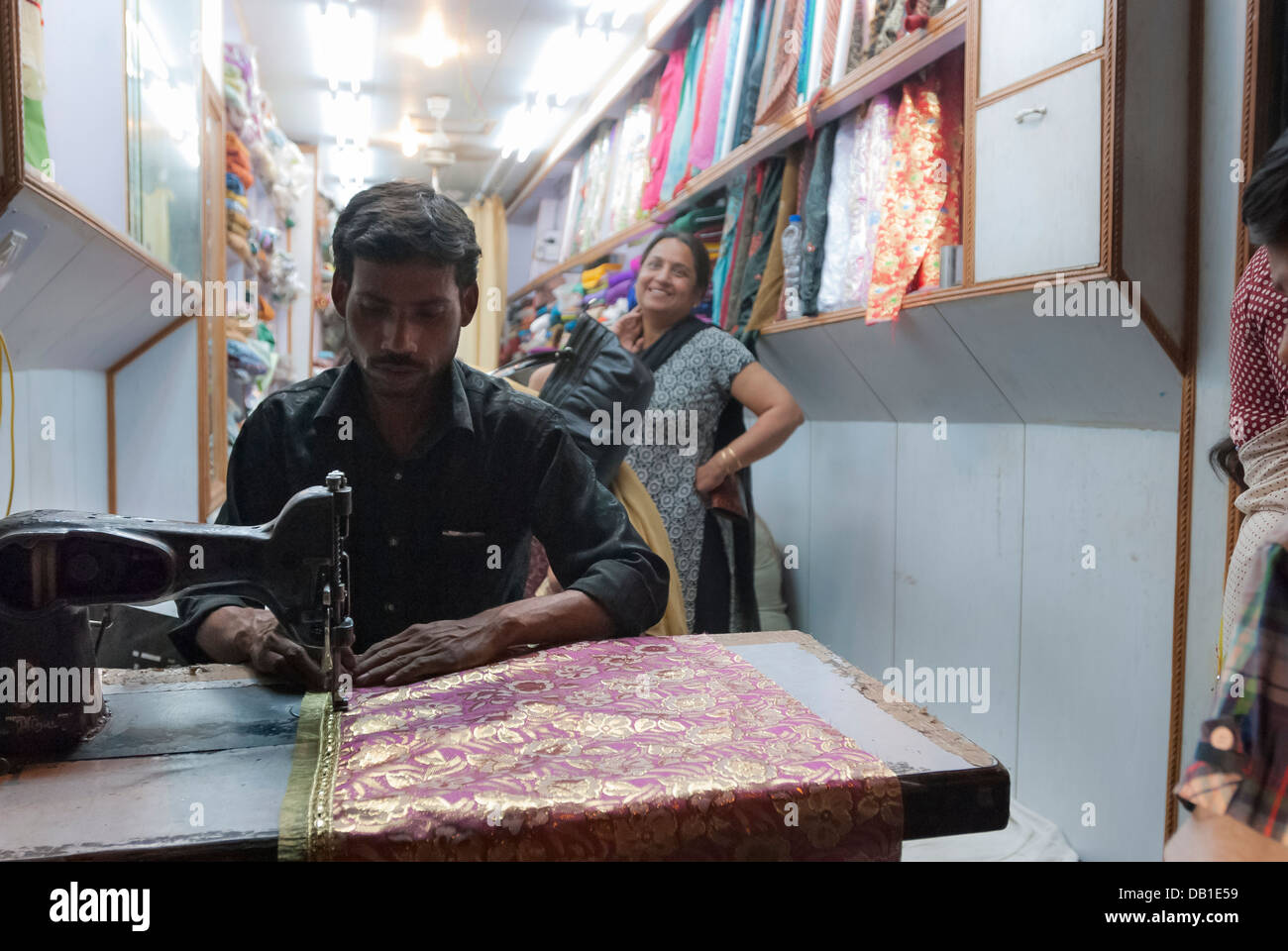 Machinist clothes sewing machine hi-res stock photography and images ...
