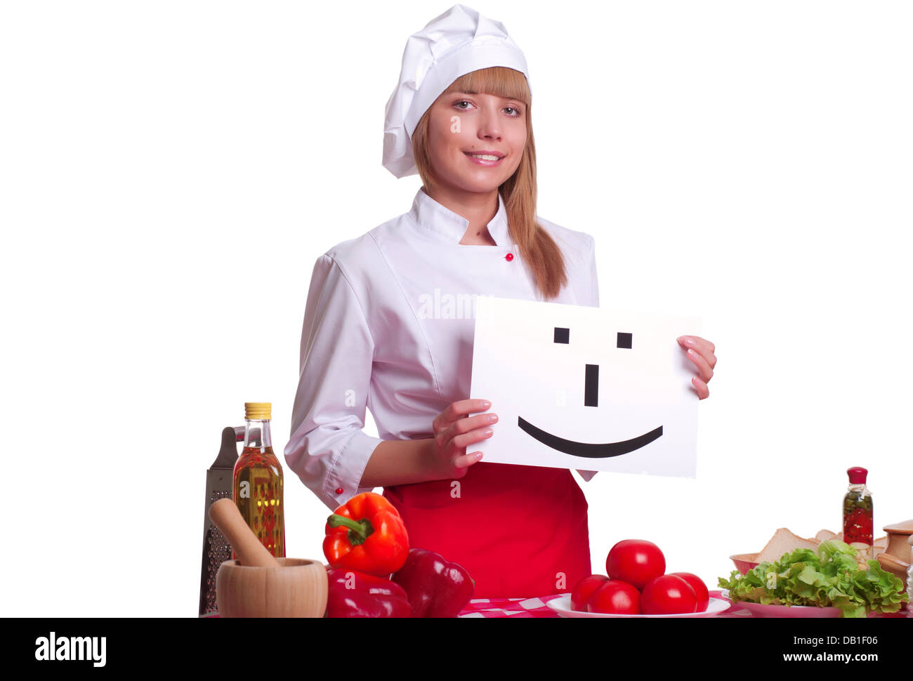 Attractive cook woman a over white background Stock Photo - Alamy