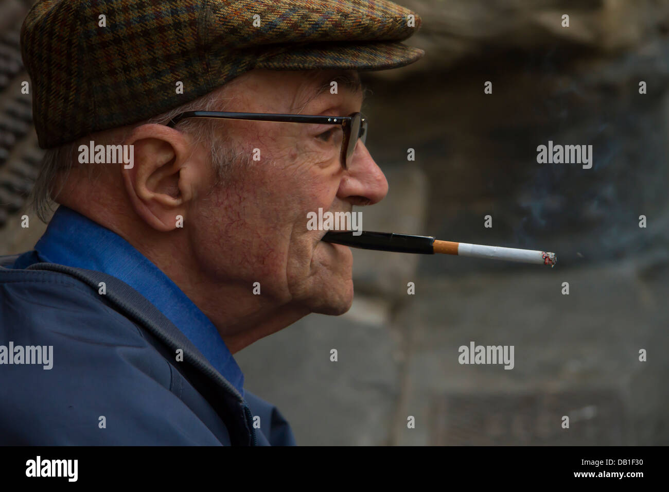 Italian man smoking a cigarette in florence hi-res stock photography ...