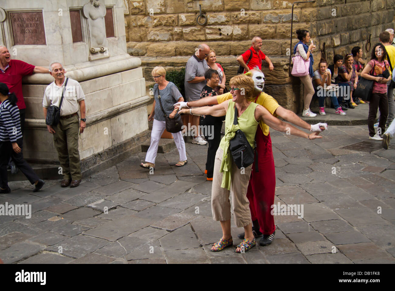 Clown entertaining tourists on the streets of Florence (Firenze), Italy ...